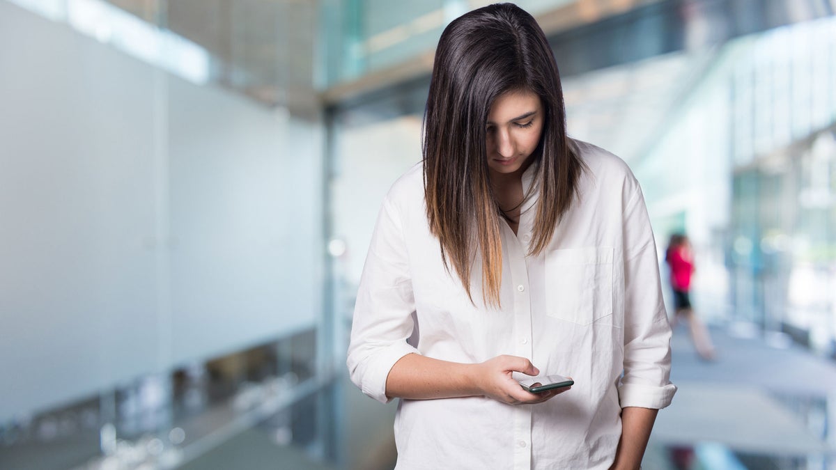 Glued to Your Smartphone? You Need this Yoga Sequence for "Text Neck."